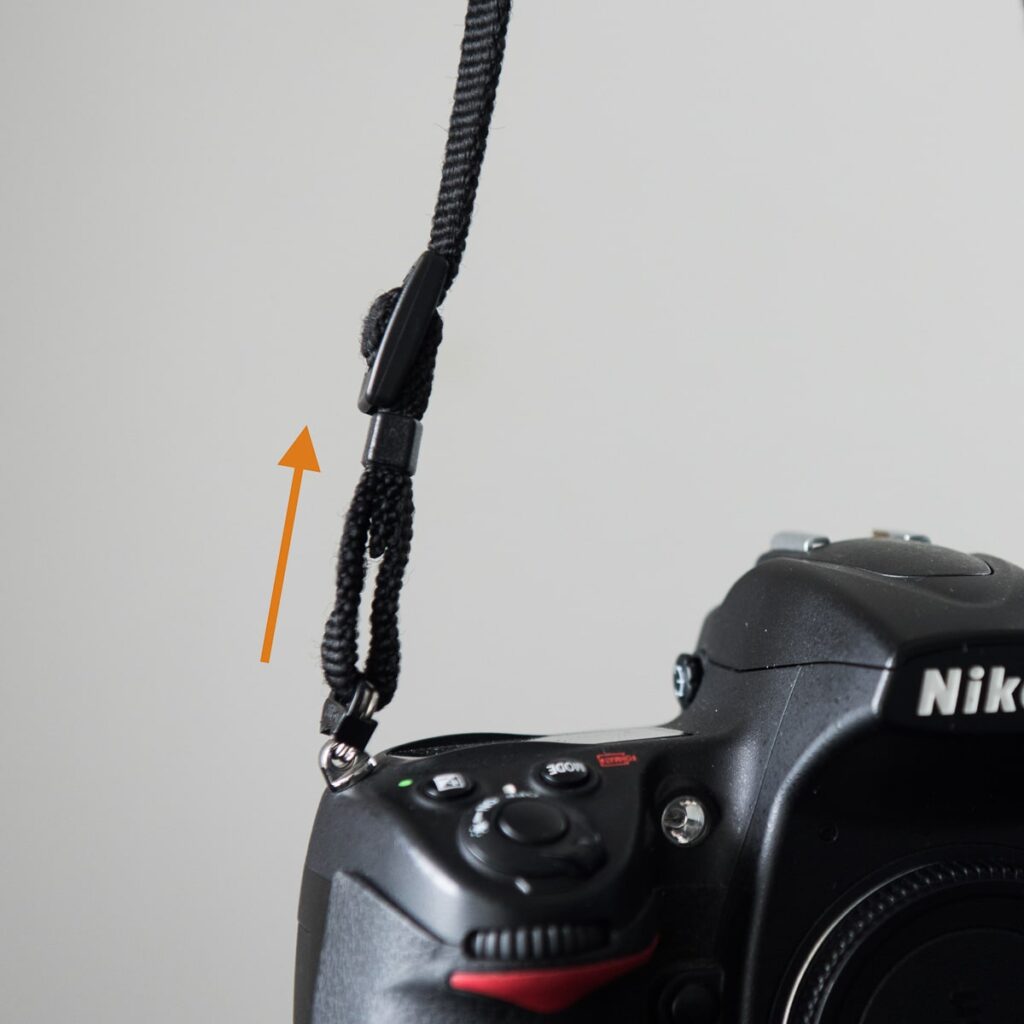 How to attach a camera strap to your camera (the right way)